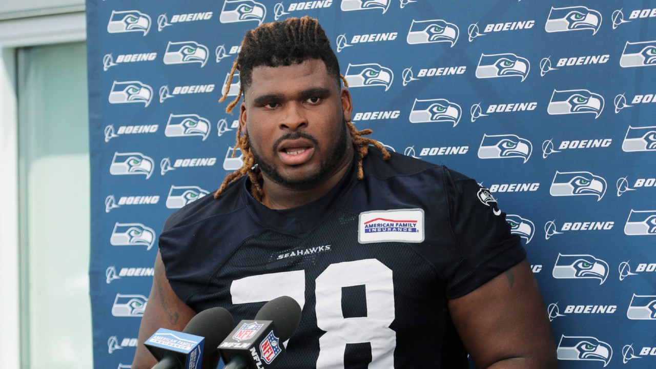 AP Source: Seattle Seahawks releasing veterans Britt, Fluker