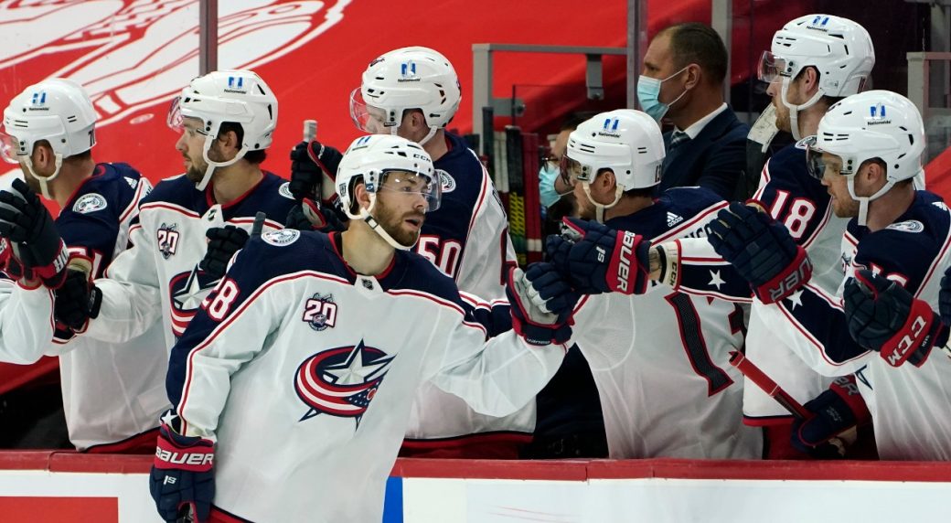 Blue Jackets hold on, defeat Red Wings for their first win