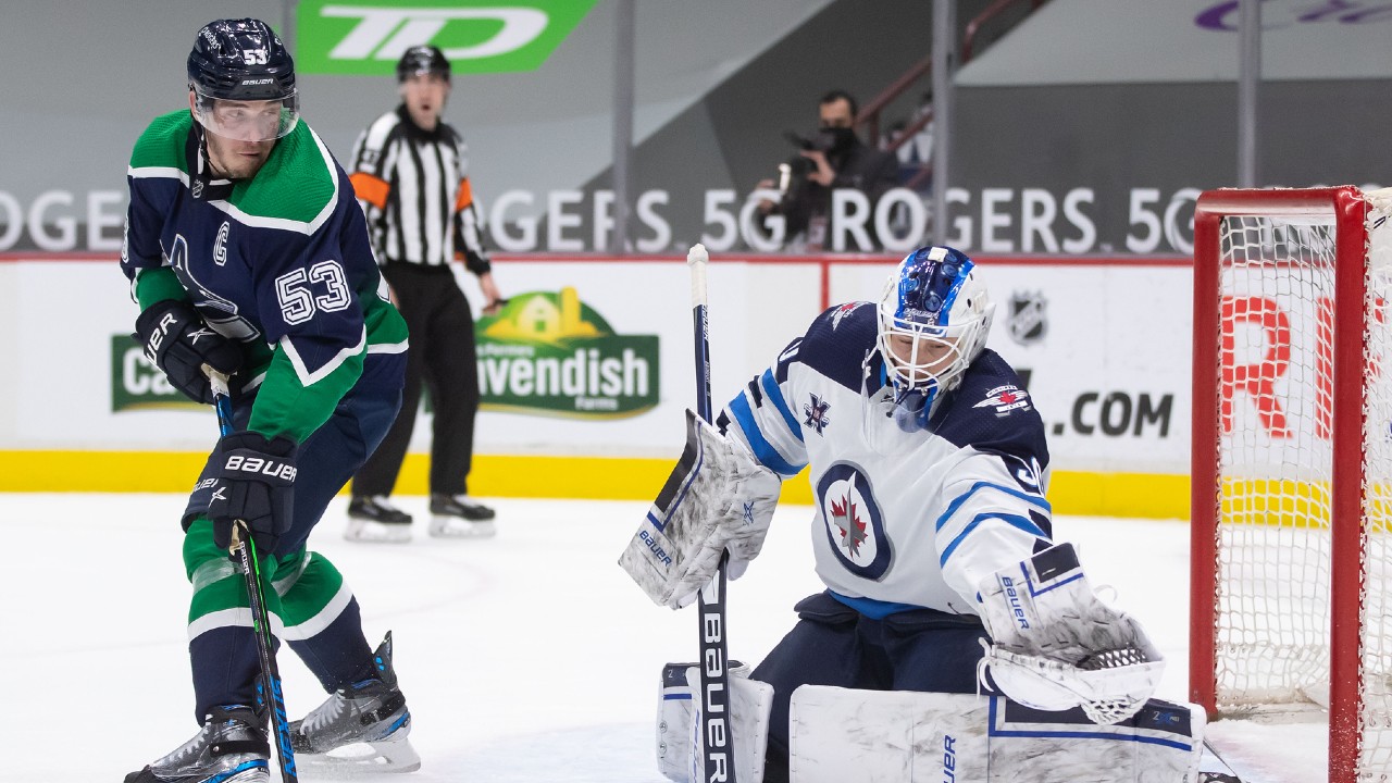 Jets down Canucks as Brossoit earns second career shutout - Sportsnet.ca