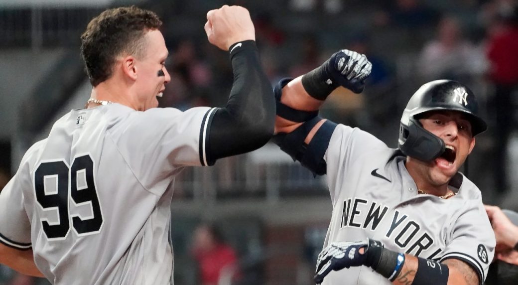 Yankees hit three home runs to hold off Braves for 11th straight win
