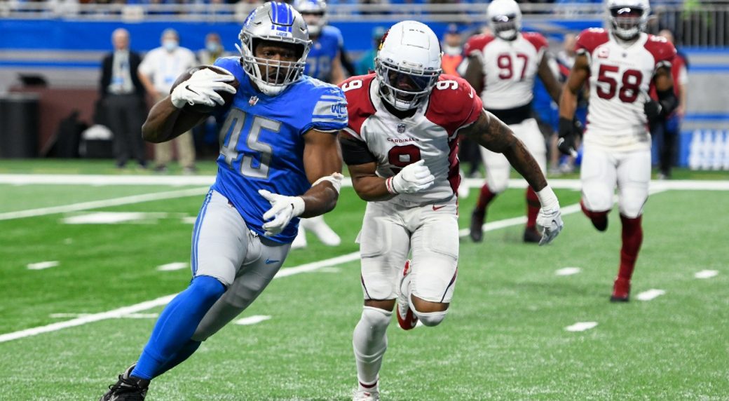 NFL Sunday Roundup: Lions stun Cardinals, Packers win division