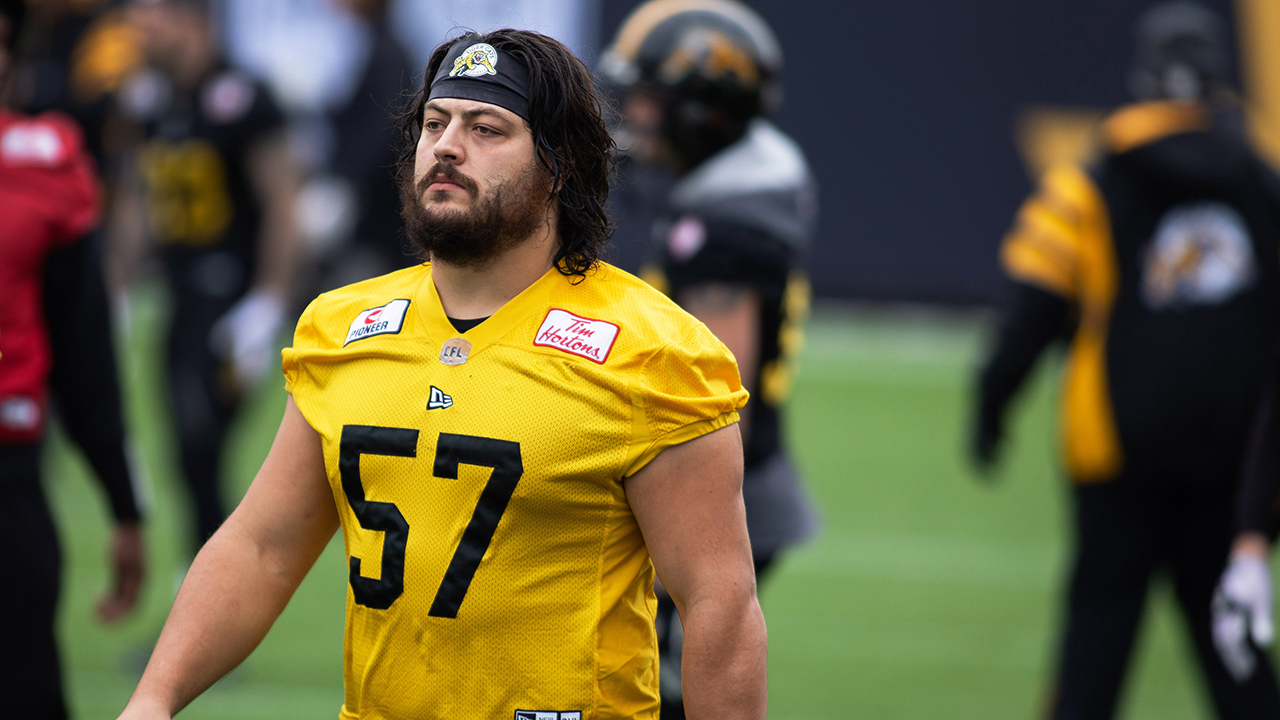Tiger-Cats re-sign star offensive lineman Revenberg to two-year ...