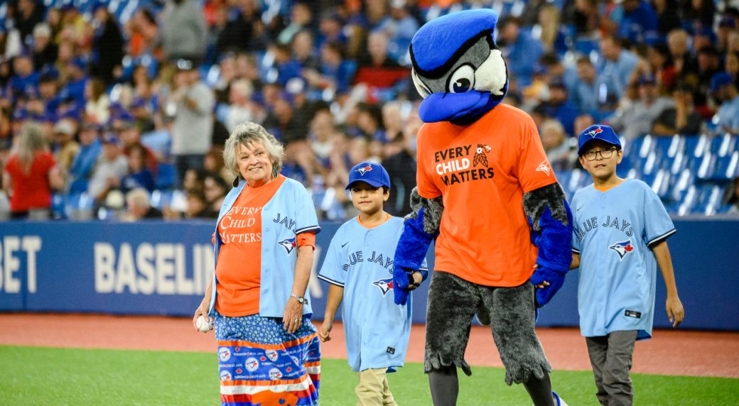 Residential school survivor throws first pitch at Blue Jays game on ...