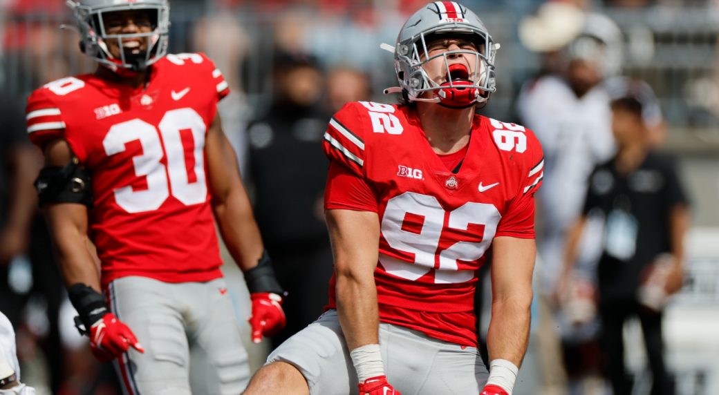 Harrison grabs three TDs, No. 3 Buckeyes rout Arkansas State