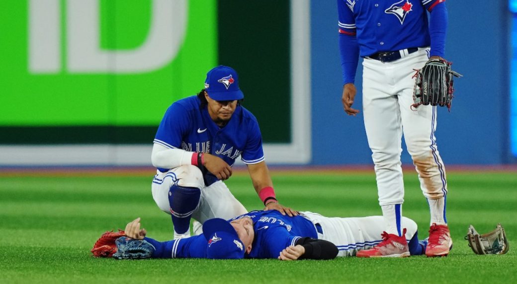 Blue Jays' Springer removed from Game 2 with injury after collision ...
