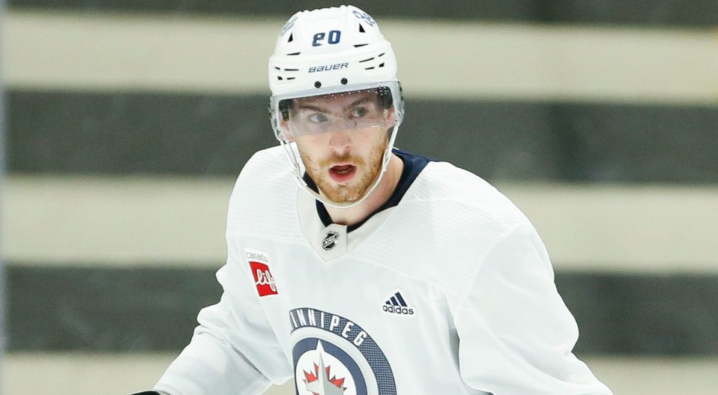 Jets' Pierre-Luc Dubois leaves game vs. Flames with lower-body injury