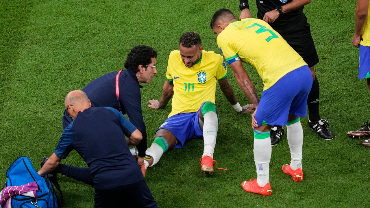Neymar, in tears, injures ankle during Brazil's World Cup win ...