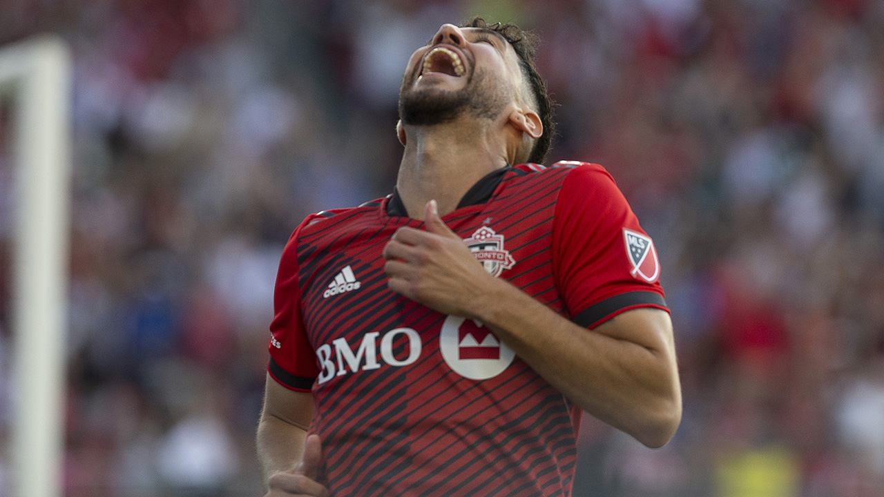 Veteran midfielder Osorio signs three-year contract to stay in Toronto ...