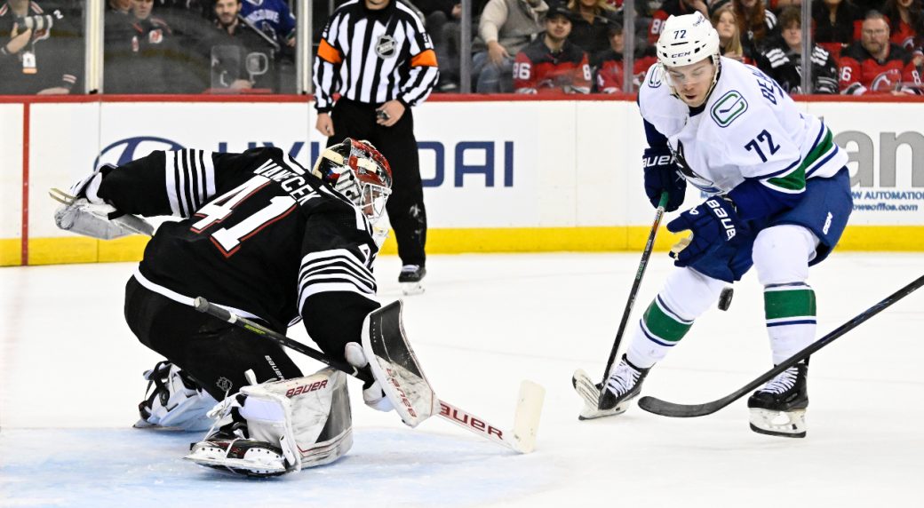 Canucks rally from three-goal deficit but fall short in overtime vs. Devils
