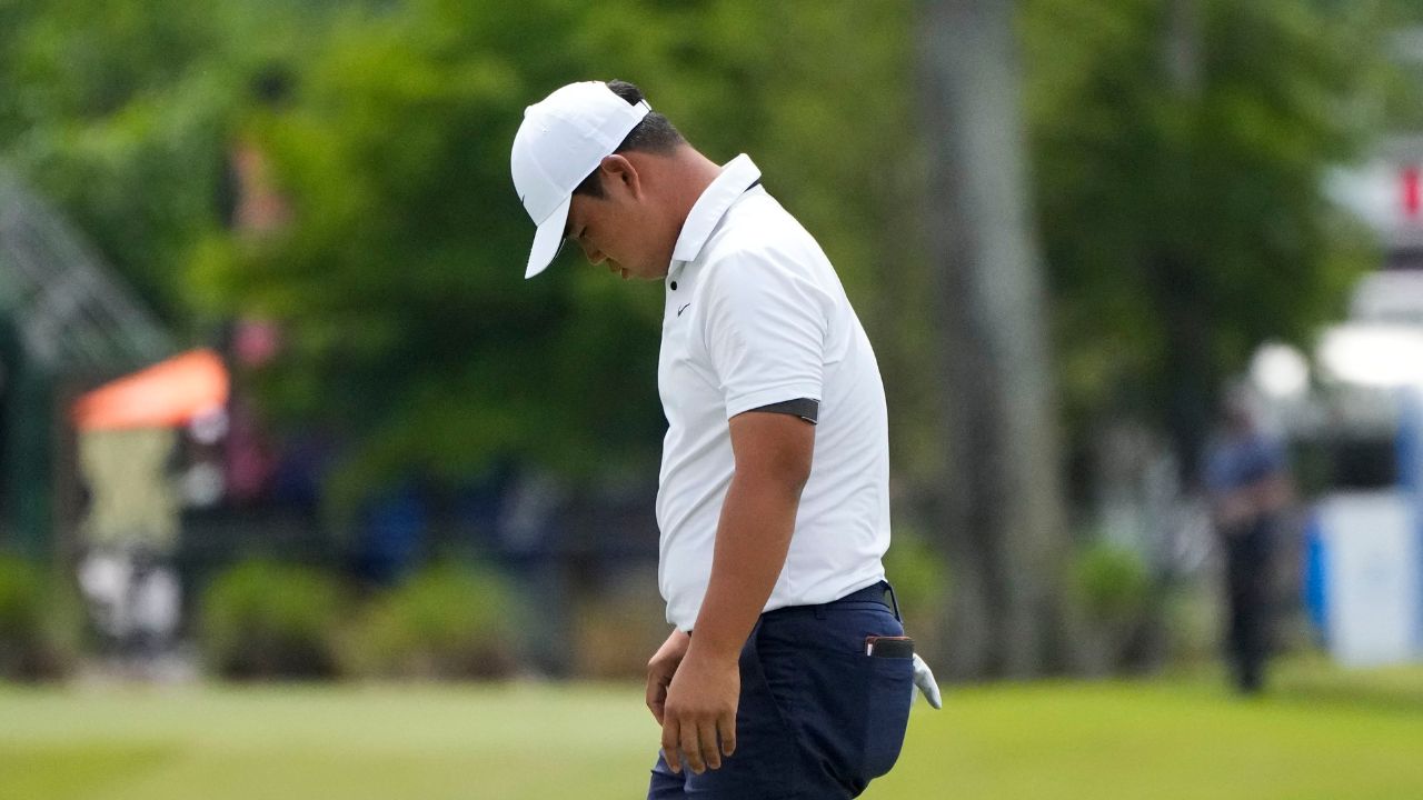 Tom Kim emerges muddy after failed attempt to retrieve ball at PGA ...