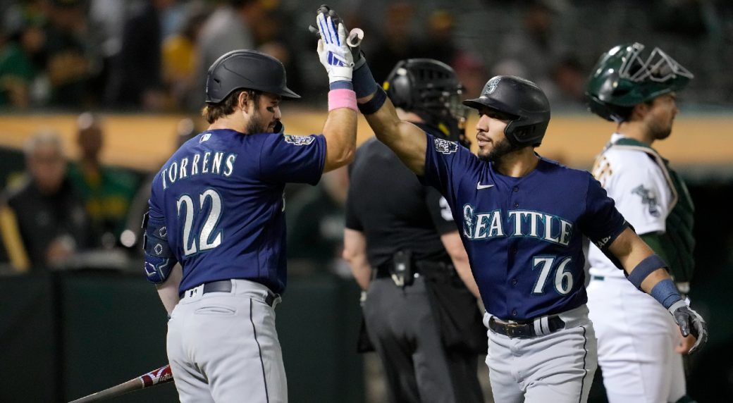 Woo wins homecoming as Mariners blank Athletics to tie for final wild-card