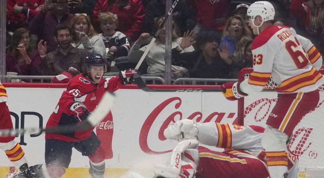 Phillips leads Capitals comeback in shootout win over Flames