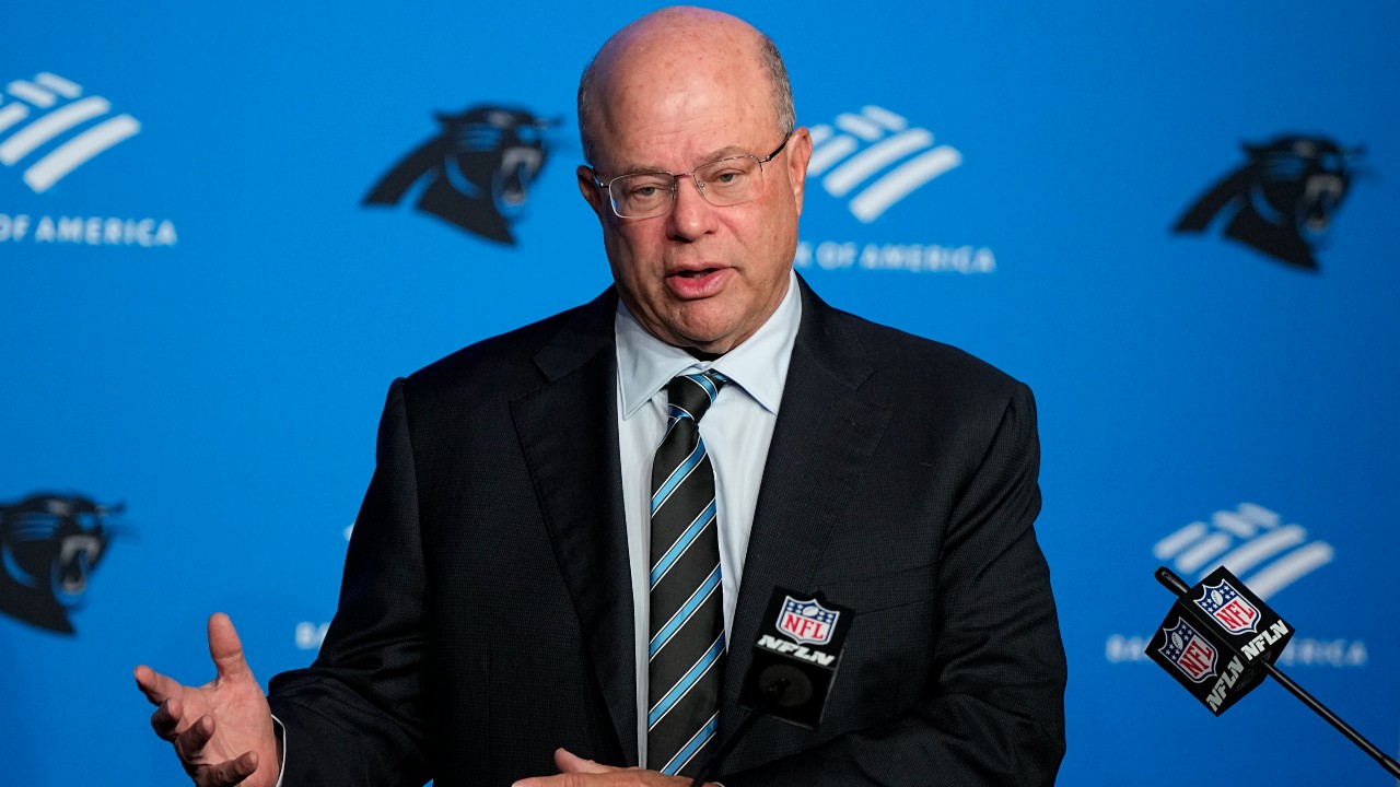 NFL fines Panthers owner $300K for throwing contents of drink at fan ...