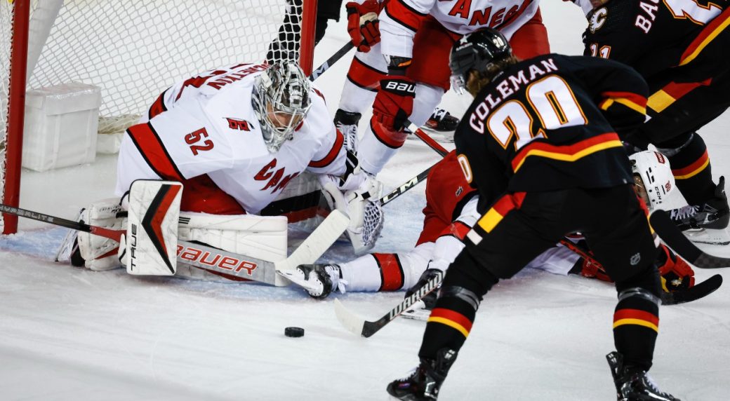 Flames use three-goal third period for comeback win over Hurricanes