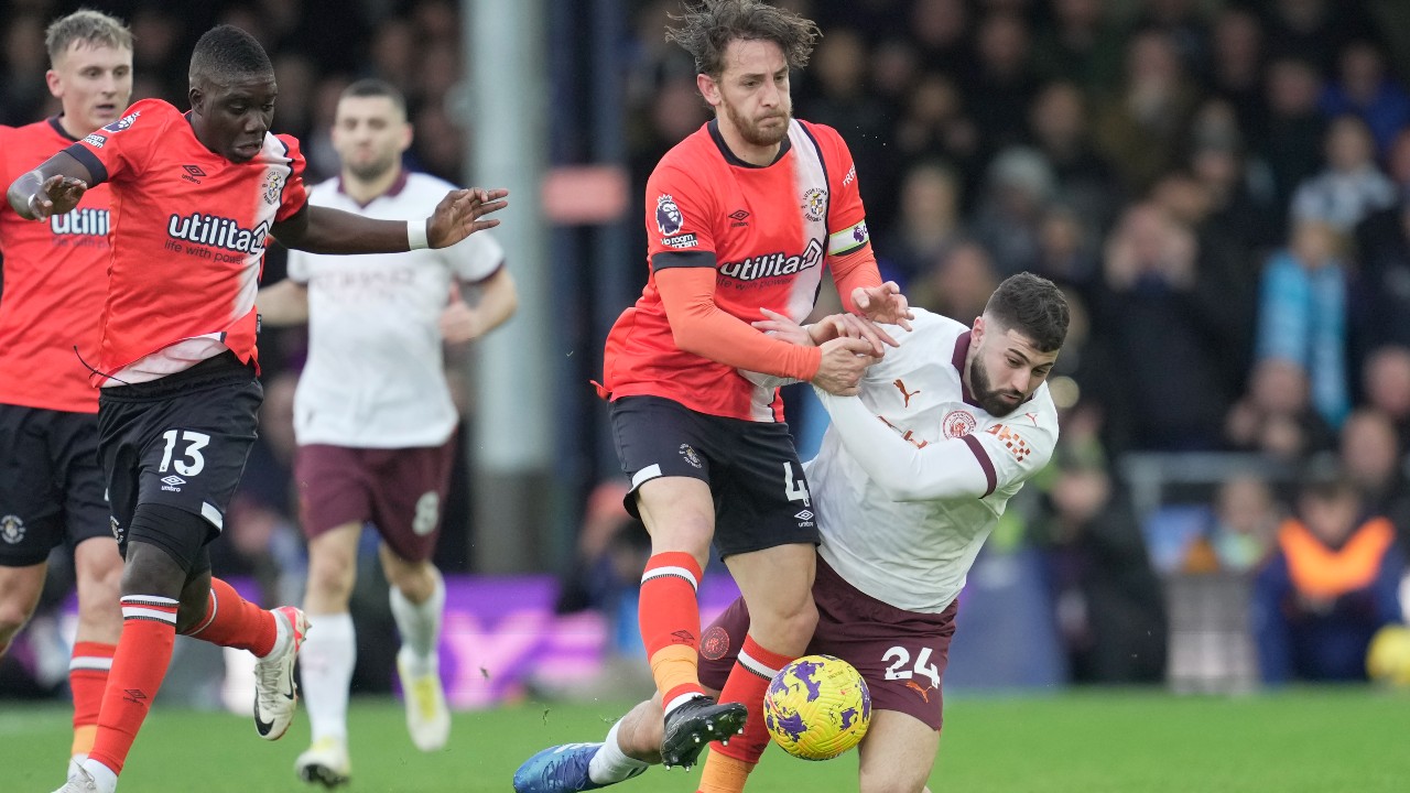 Luton captain Lockyer has defibrillator fitted, out of hospital after ...