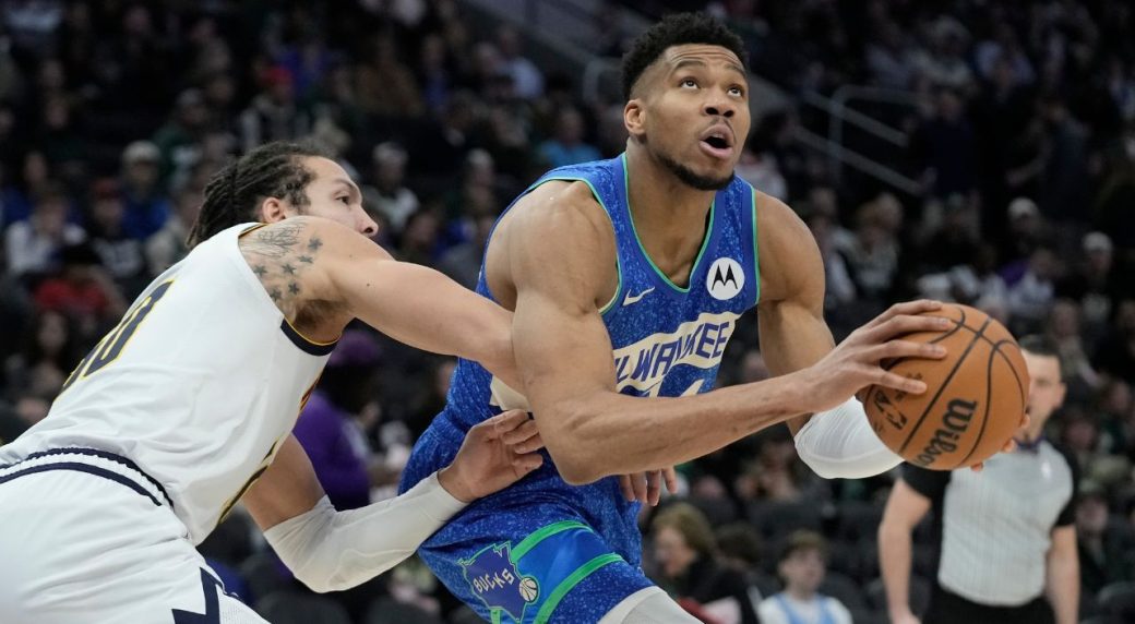 Antetokounmpo, Bucks flex defensive muscle in win over Nuggets
