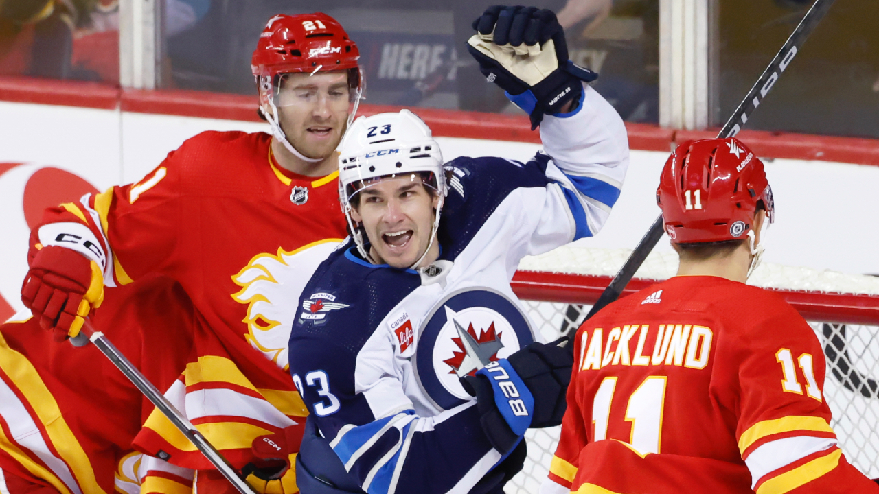 Monahan's hat trick not enough as Jets fall to Flames, snap three-game ...