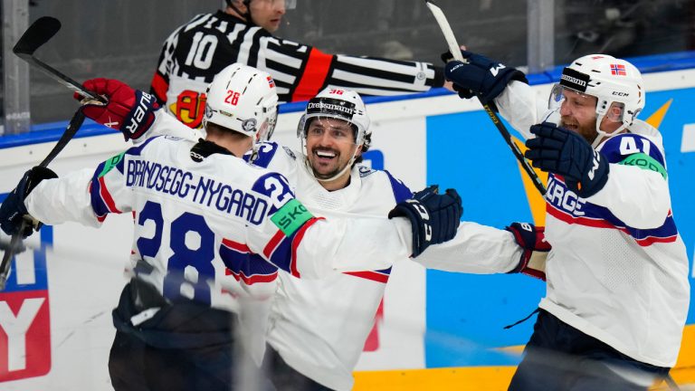 Latvia beats Kazakhstan, Norway tops Denmark at hockey worlds ...