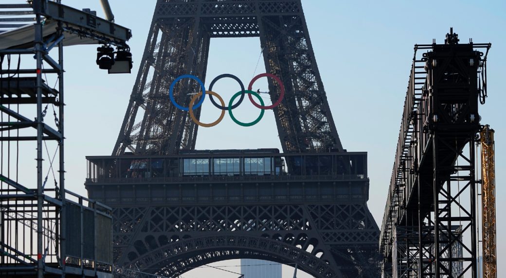 Paris organizers unveil display of five Olympic rings mounted on Eiffel ...