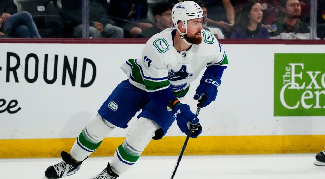 After signing eight-year extension, Canucks' Hronek motivated to reach ...