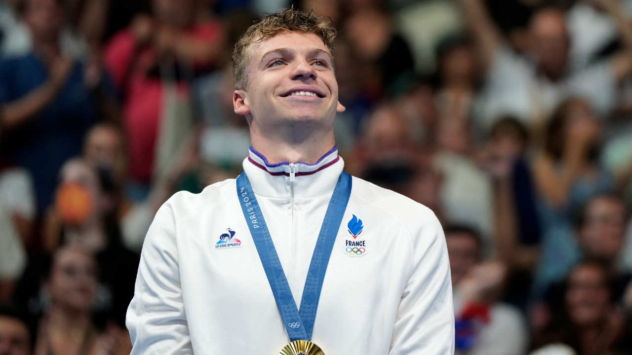 Marchand pulls off one of the most audacious doubles in swimming ...