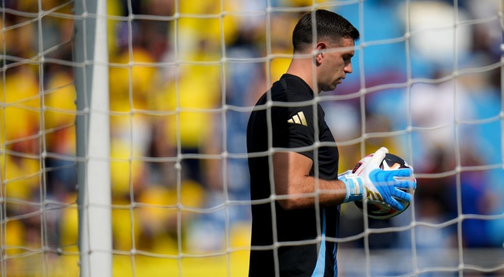 Argentina goalkeeper Martinez under fire for hitting cameraman after ...