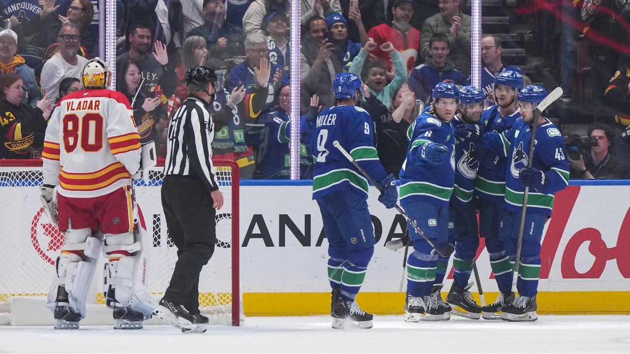 Canucks jump out to record four first-period goals in season-opener vs ...