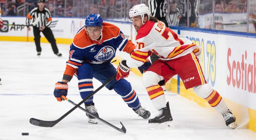 Flames score four unanswered goals to beat Oilers in Battle of Alberta