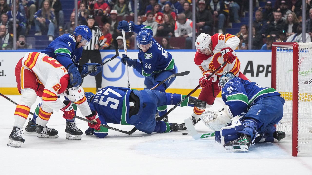 Flames complete come back with overtime winner over Canucks - Sportsnet.ca
