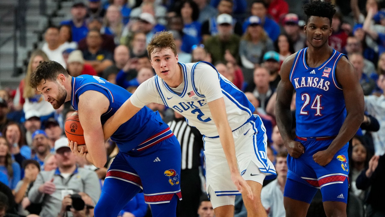Kansas's Hunter Dickinson ejected for kicking Duke's Maliq Brown in the ...