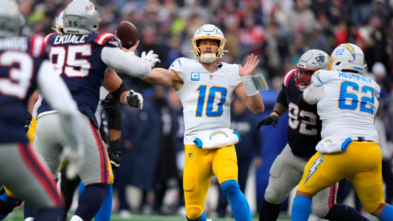Herbert throws three TDs, Chargers clinch playoff spot with rout of ...