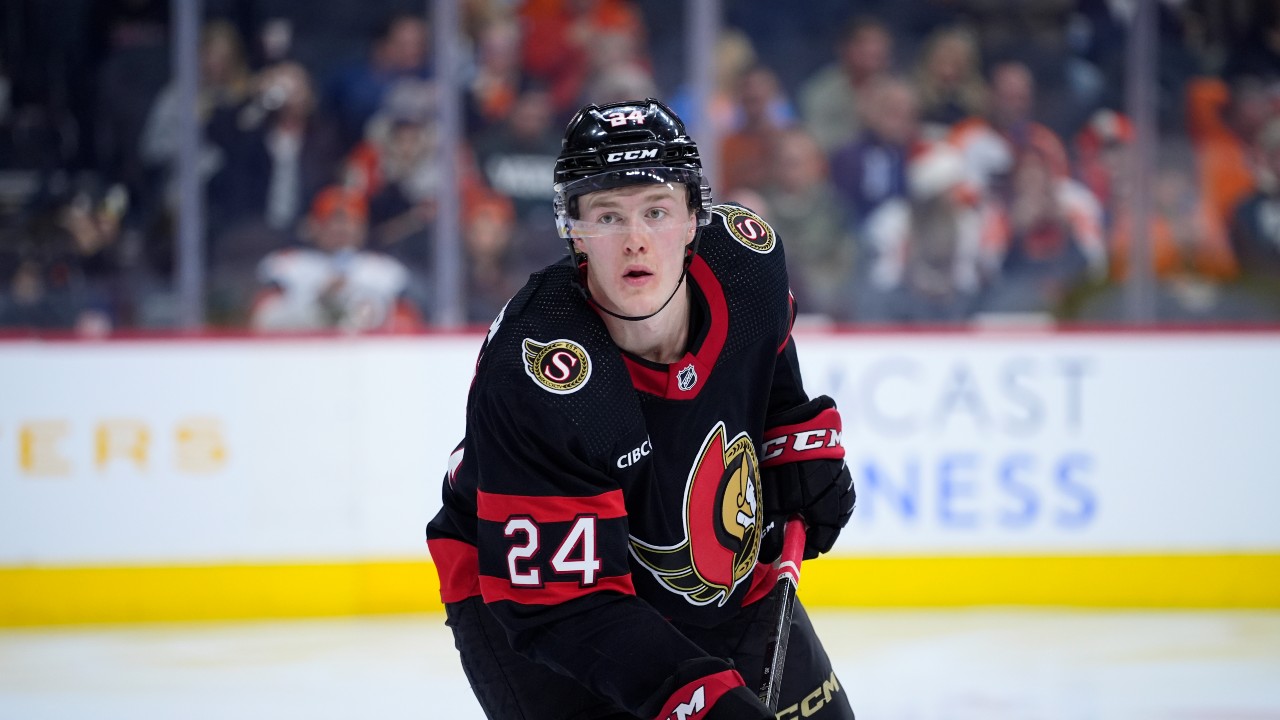 Senators' Jacob Bernard-Docker helped off ice after run into boards at ...