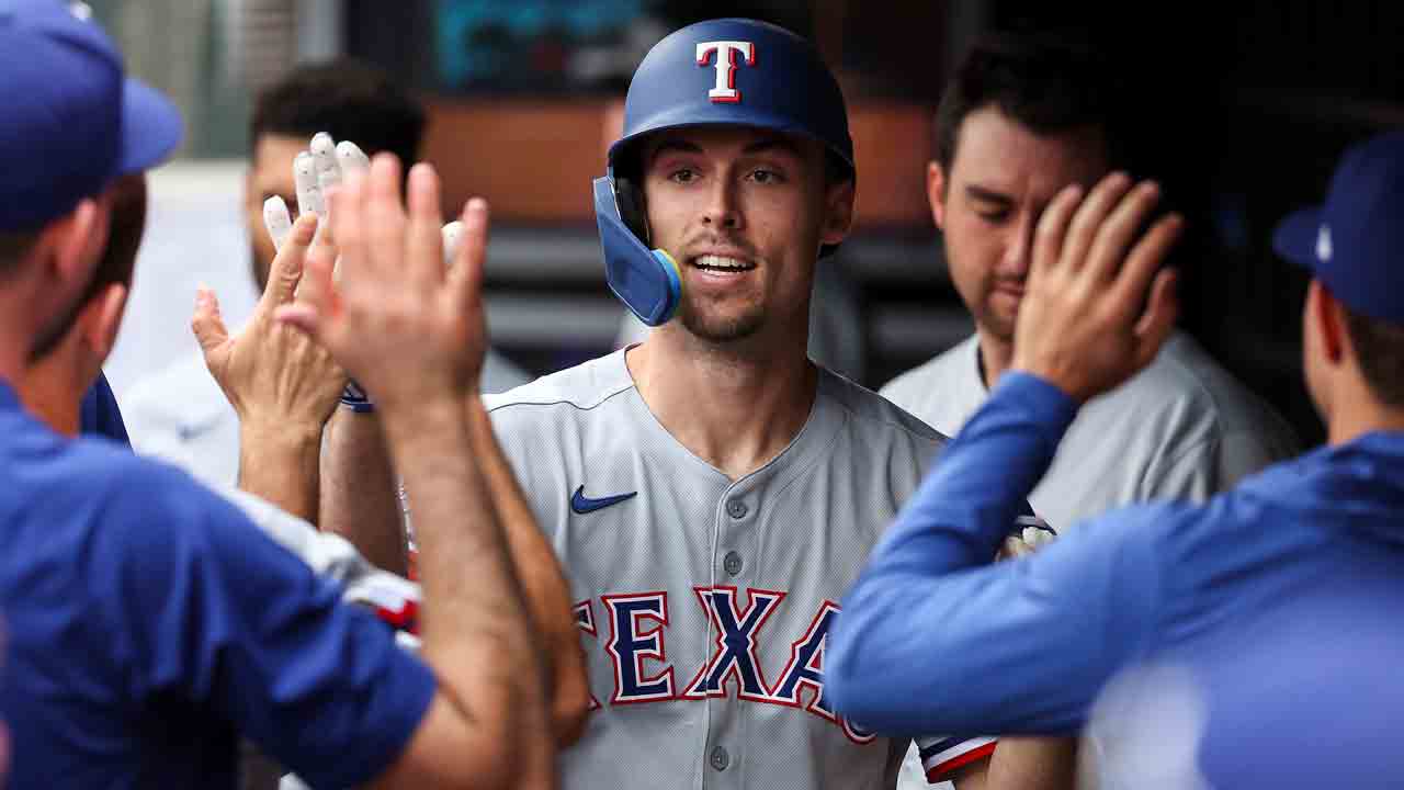 Rangers CF Evan Carter leaves with right wrist soreness after ...