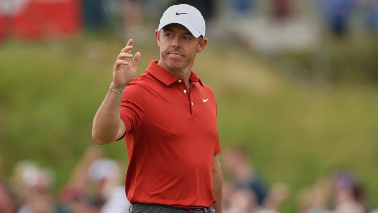 Buried ball baffles McIlroy in wild third round for hometown hero at ...