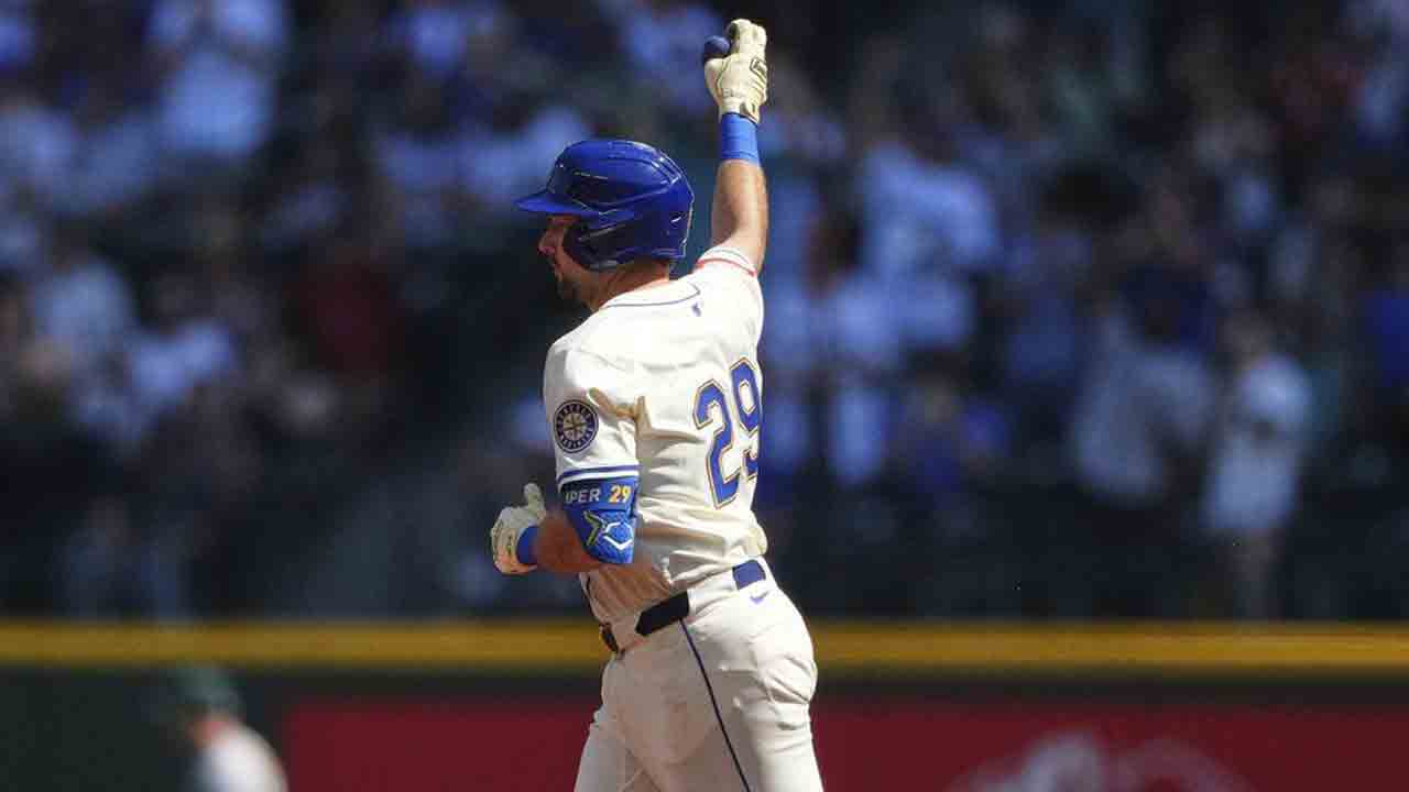 Mariners' Cal Raleigh homers twice to break single-season catcher ...