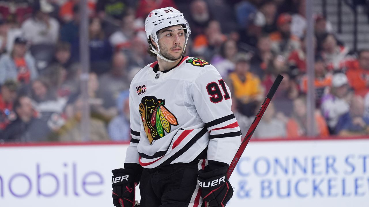 Blackhawks forward Nazar departs after getting hit in the face with a ...